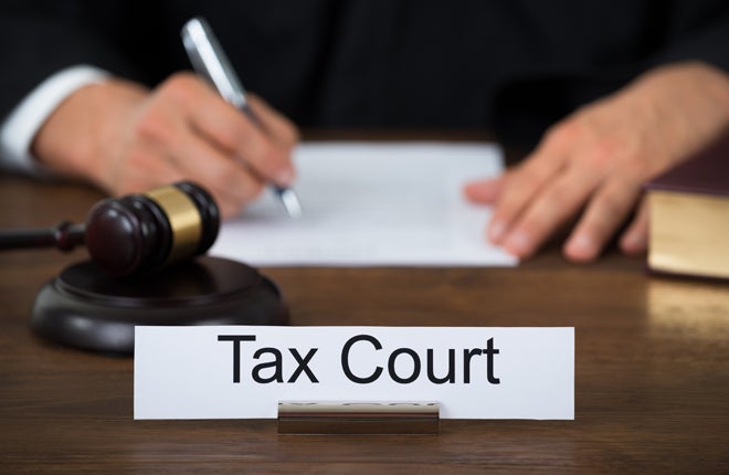 Taxpayer's failure to review tax return contributed to negligence, Tax ...