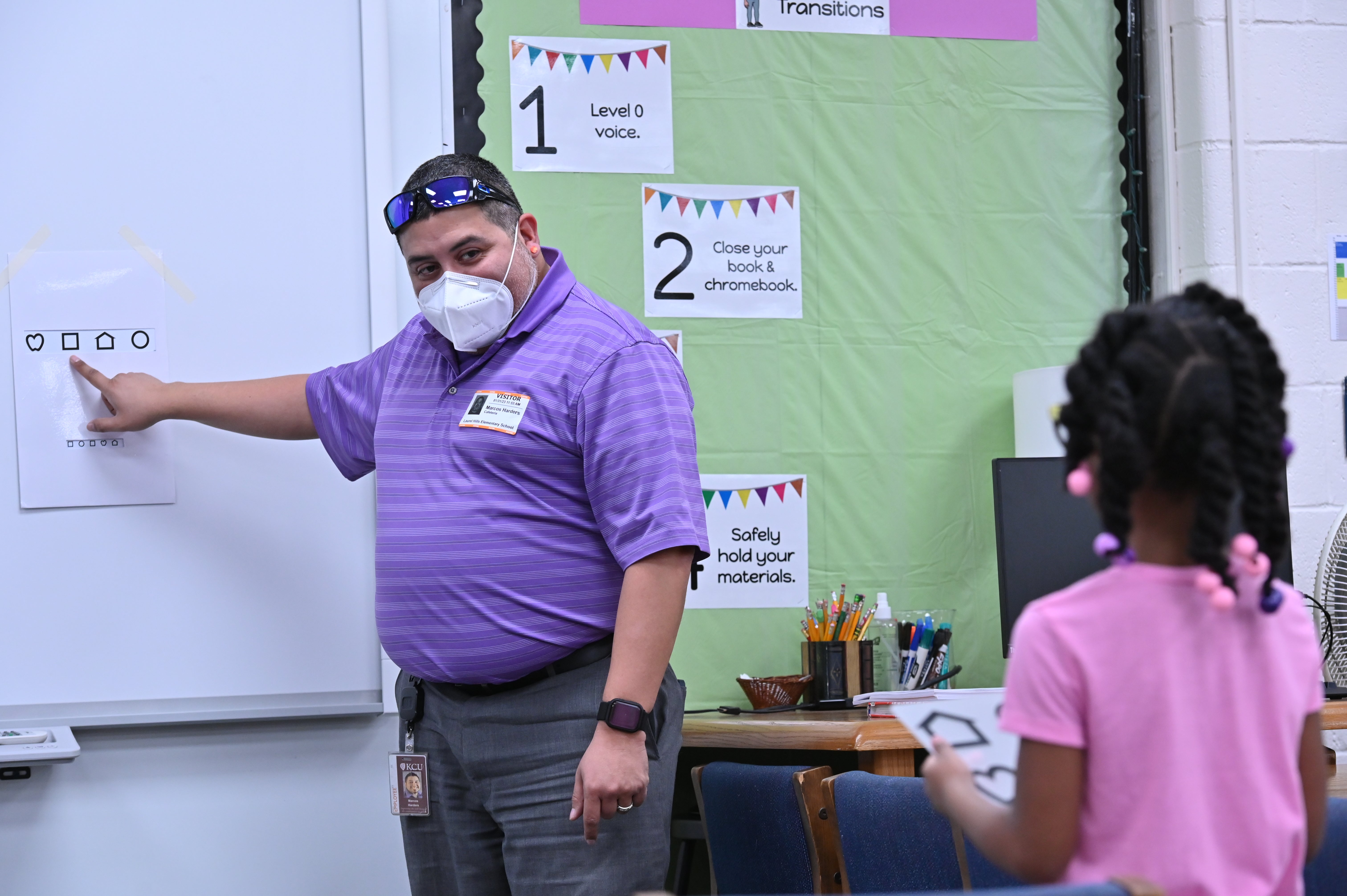 KCU staff and faculty volunteers assist with Score 1 for Health